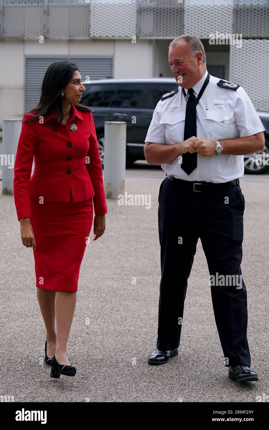 Home Secretary Suella Braverman (left) is met by Chief Constable of ...