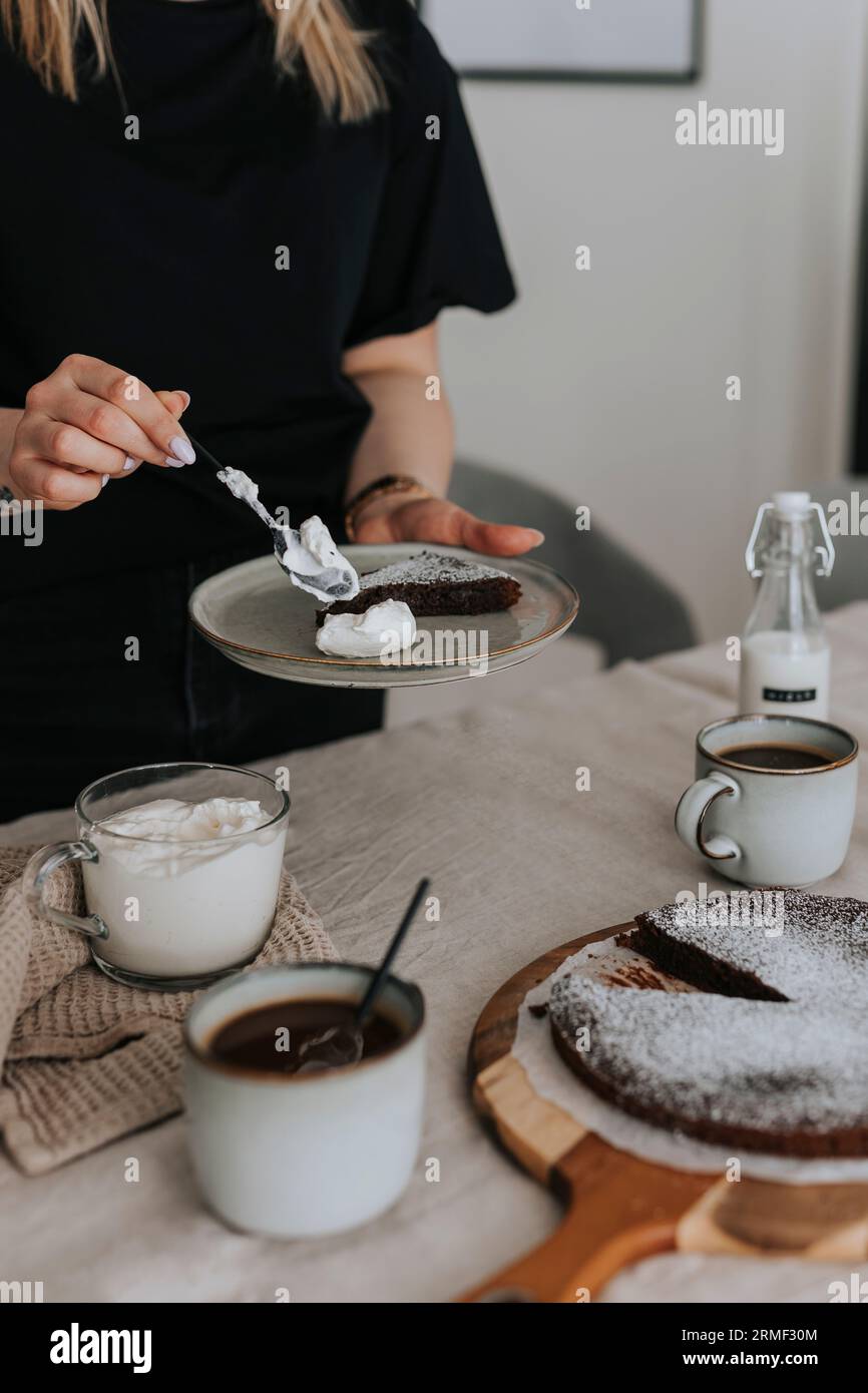 Adding whipped cream chocolate drink hi-res stock photography and ...