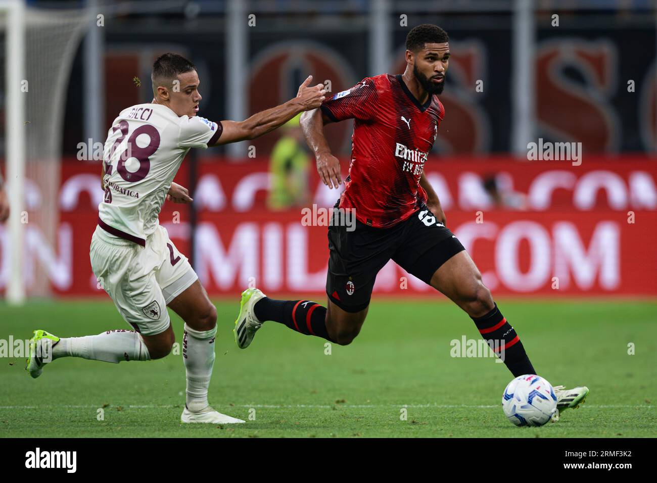 Ruben Loftus-Cheek of AC Milan competes for the ball with Samuele Ricci ...