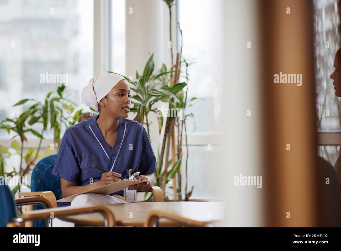 Professional therapist taking notes hi-res stock photography and images ...