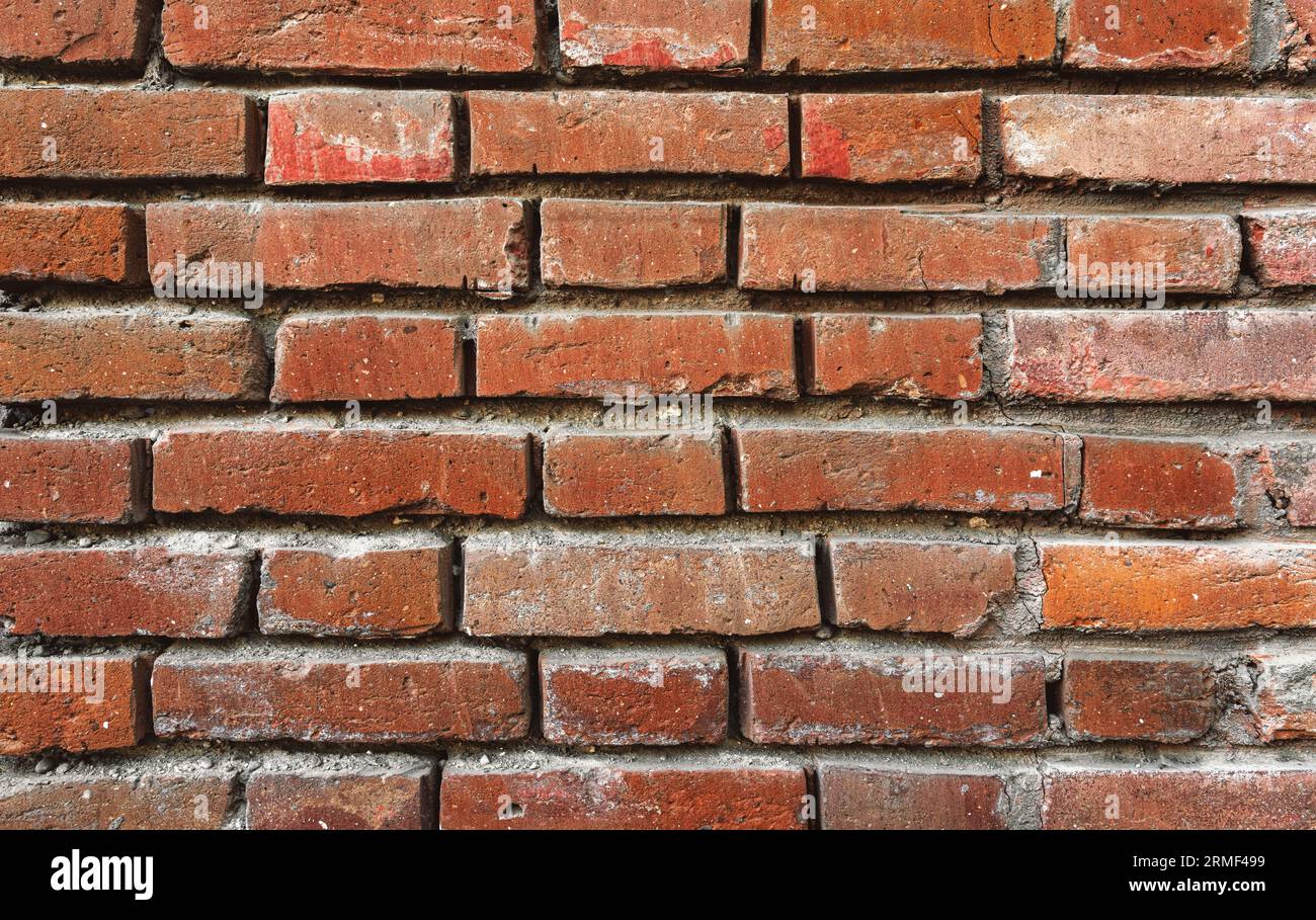 Old weathered brick wall background Stock Photo - Alamy