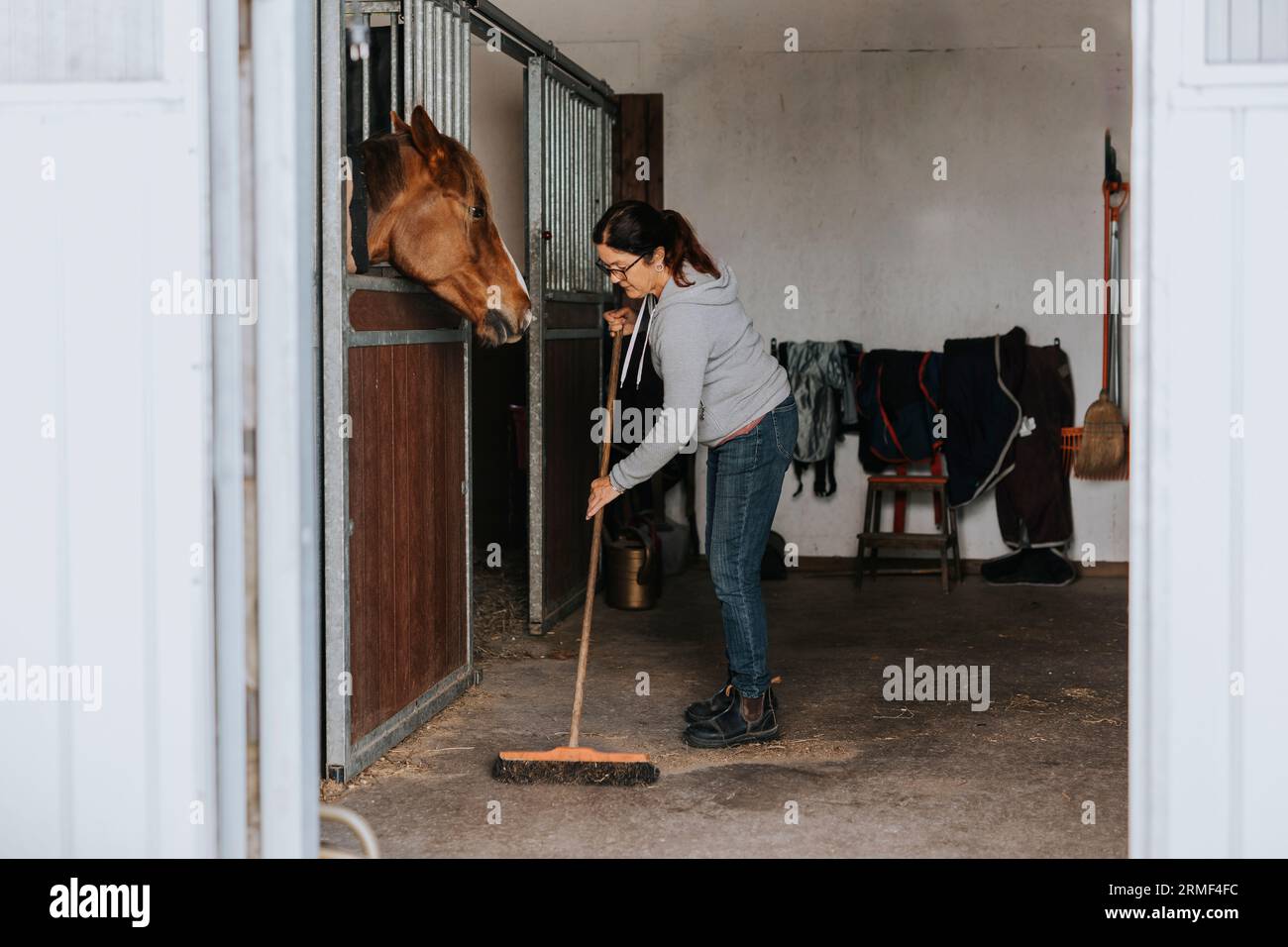 Person school sweeping hi-res stock photography and images - Alamy