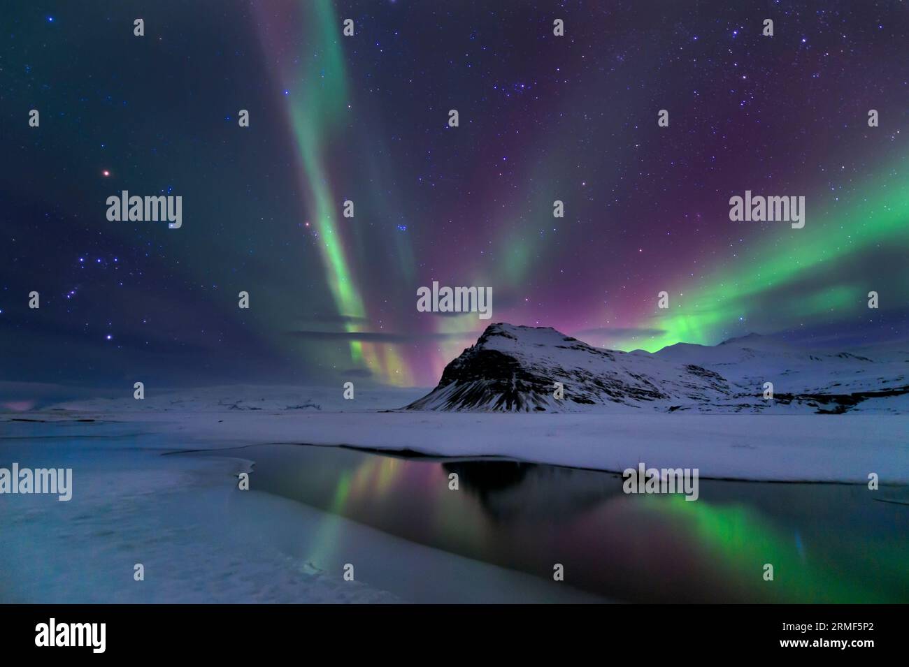 Northern lights in iceland during winter period Stock Photo - Alamy
