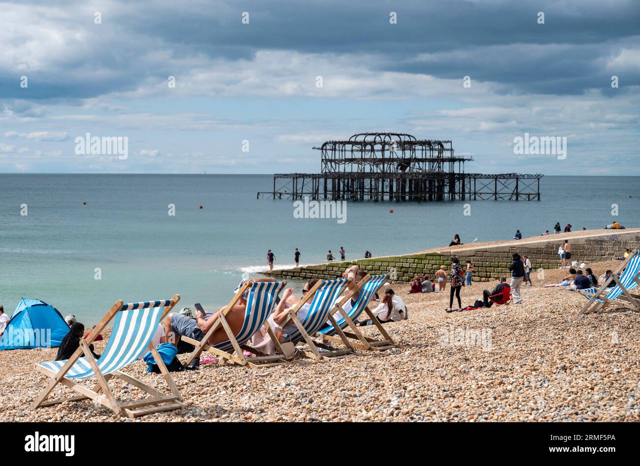 Brighton UK 28th August 2023 - Bank Holiday Monday visitors enjoy a ...