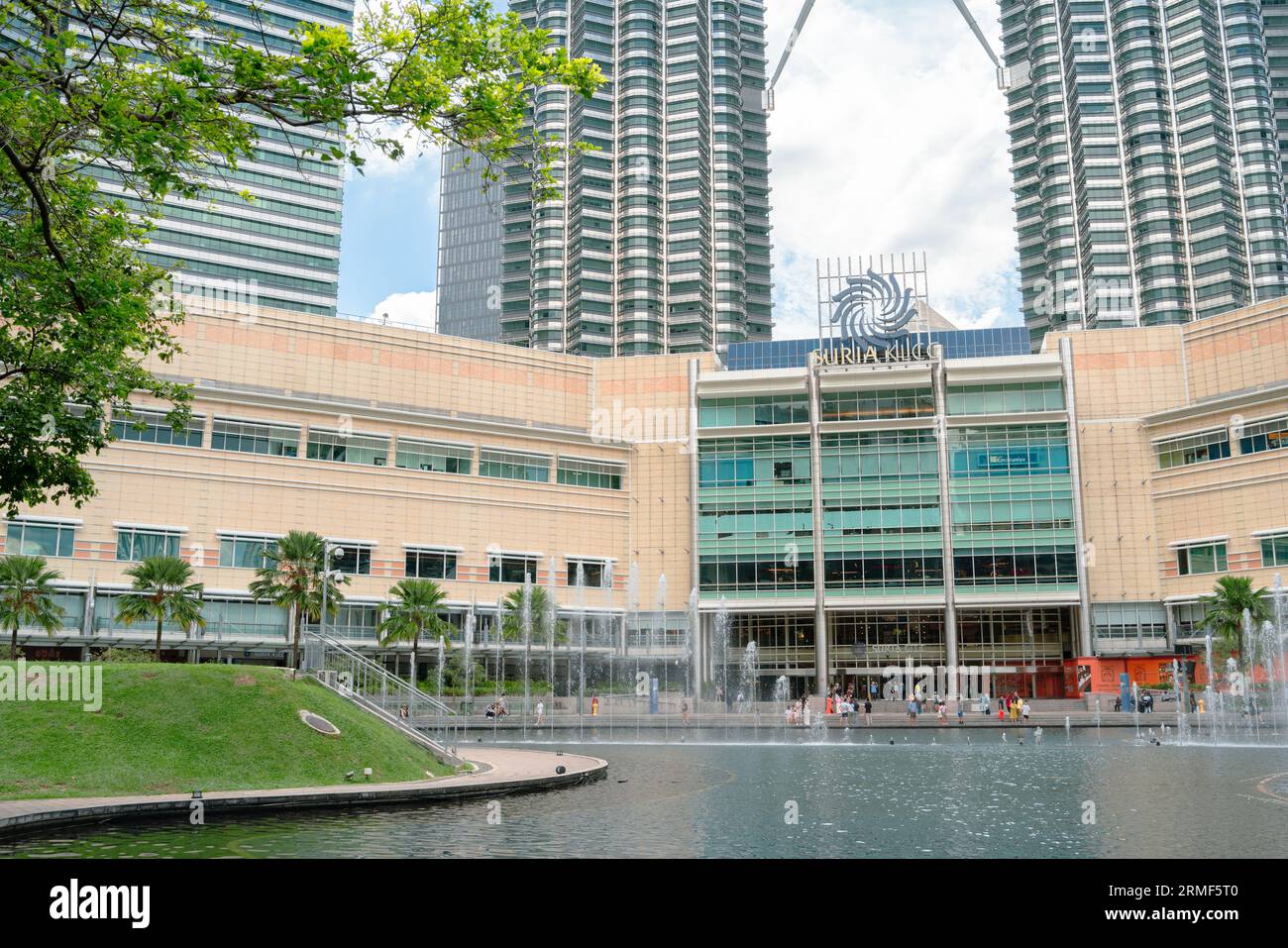 Kuala Lumpur, Malaysia - July 10, 2023 : KLCC central park and Suria ...