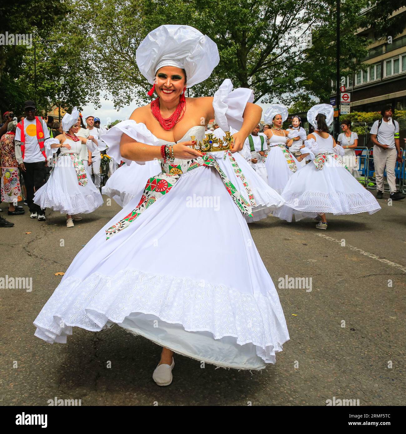 London, UK, 28th Aug 2023. Baque de Axé from Puerto Rico in all white ...