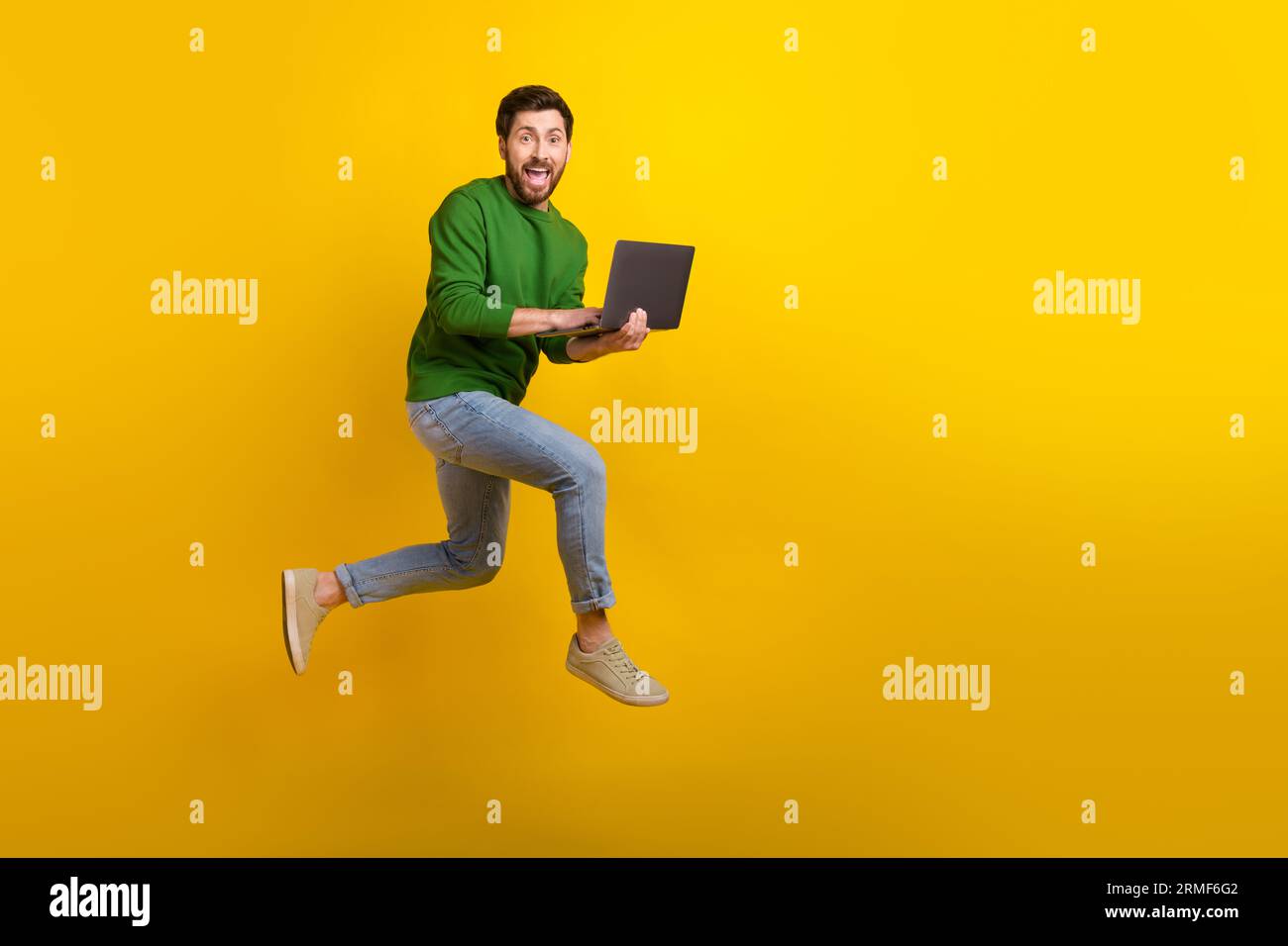 Full length body photo of guy running it specialist leader director ...