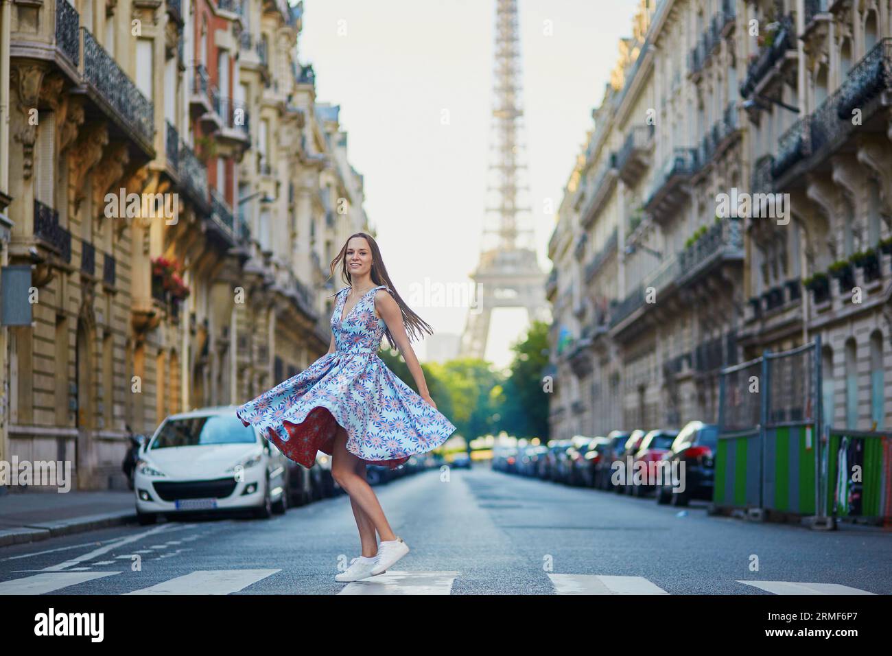 Paris girl crossing the street hi-res stock photography and images - Alamy