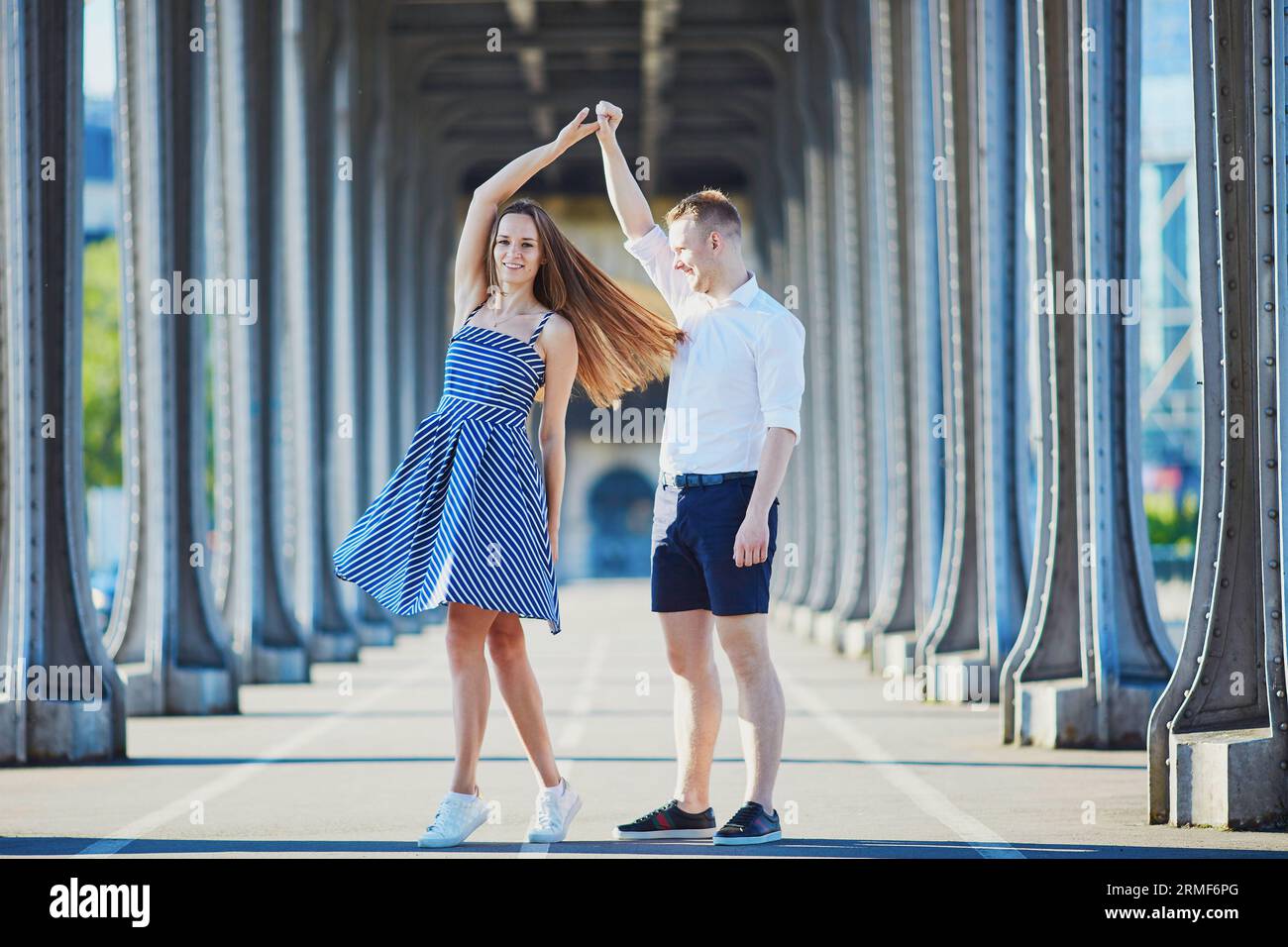 Happy girl dancing on city hi-res stock photography and images - Alamy