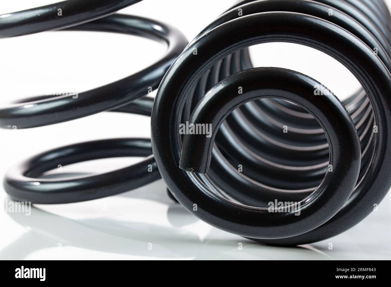 Heavy Duty Coil Springs for a truck on a white background Stock Photo ...