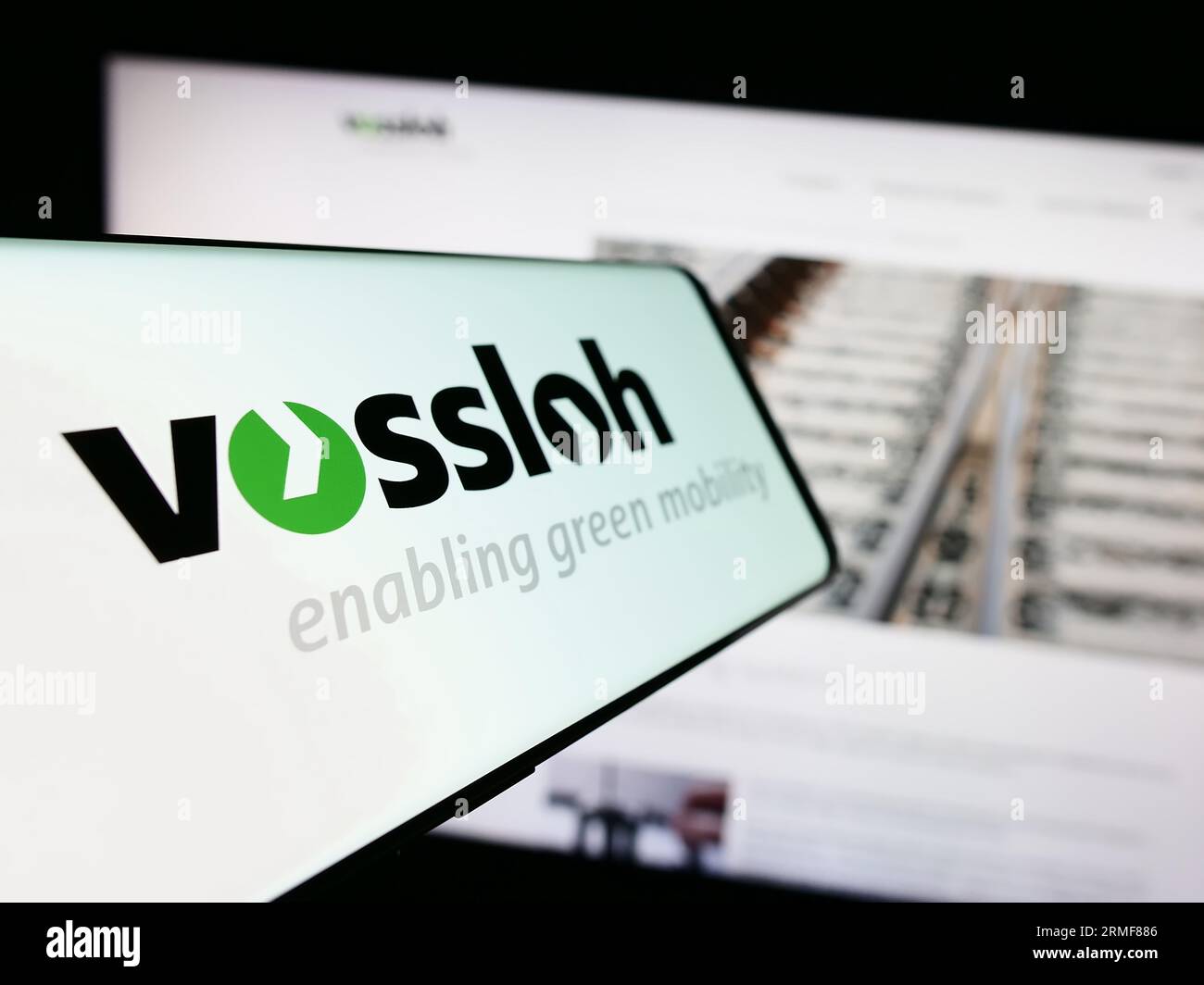 Smartphone with logo of German rail technology company Vossloh AG on ...