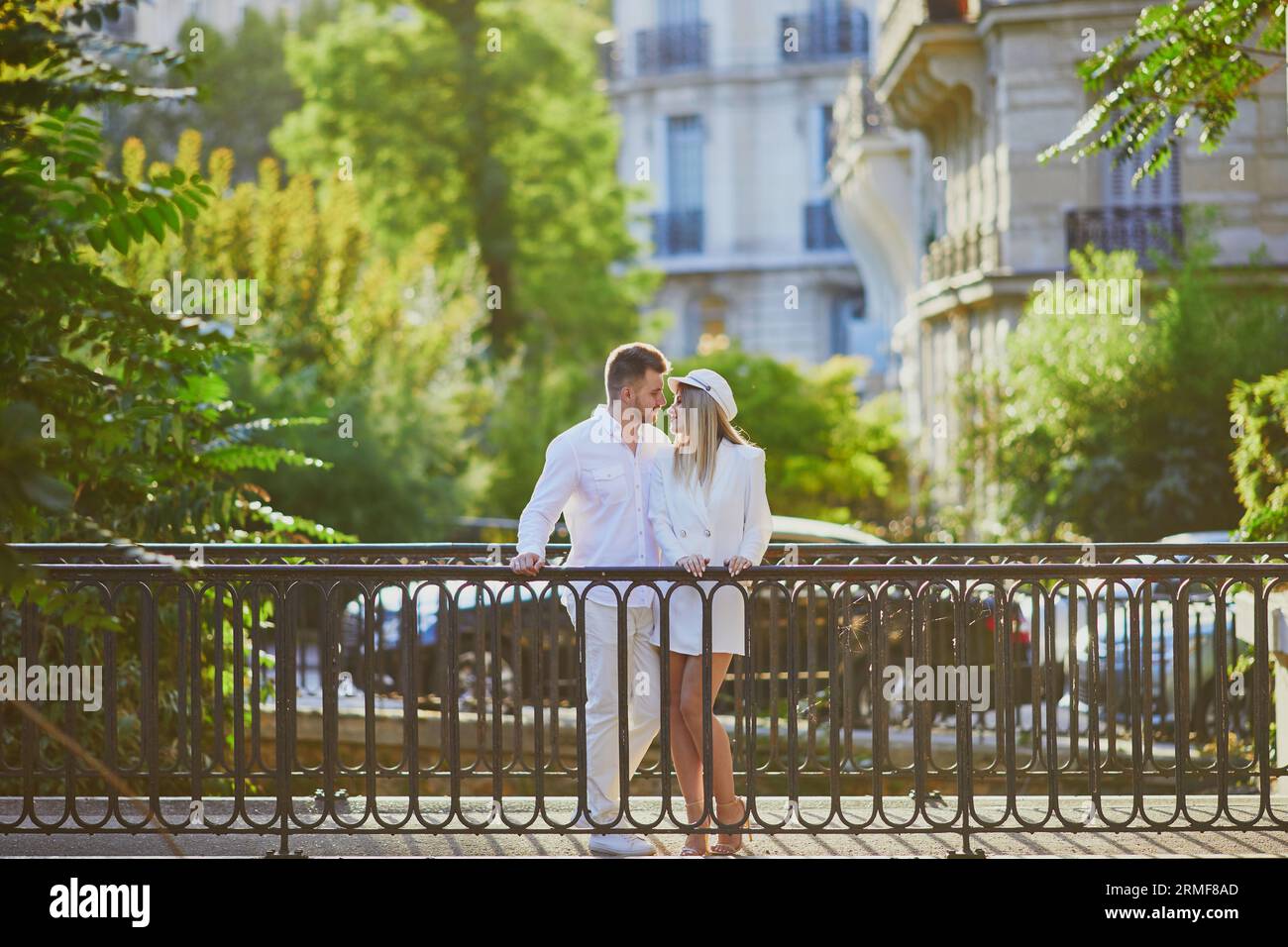 Romantic couple having a date in Paris. Tourists in France enjoying the ...