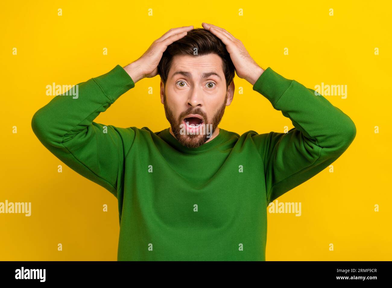 Portrait of young funny workaholic director company man hands head ...