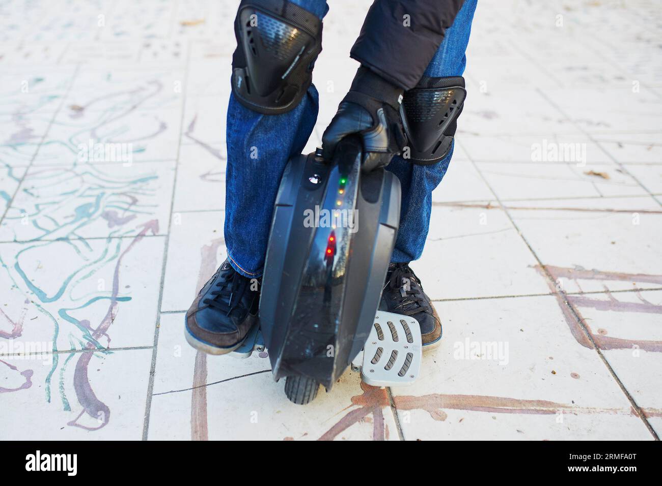 Man legs on mono wheel. Personal electrical transport concept Stock ...