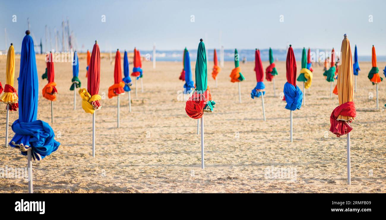 The famous colorful parasols on Deauville Beach, Normandy, Northern ...