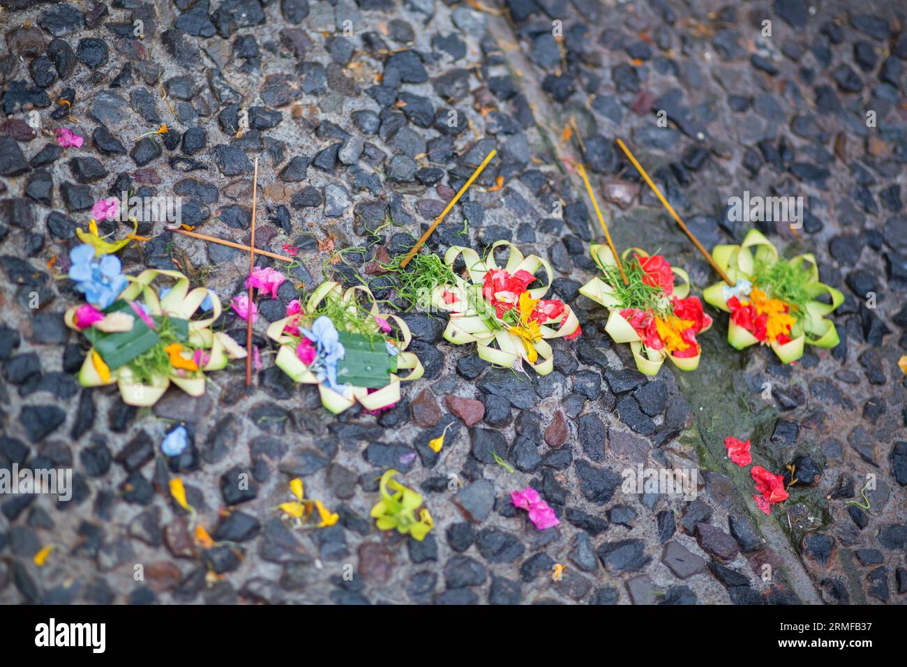 Traditional balinese offerings to gods in Bali with flowers and ...