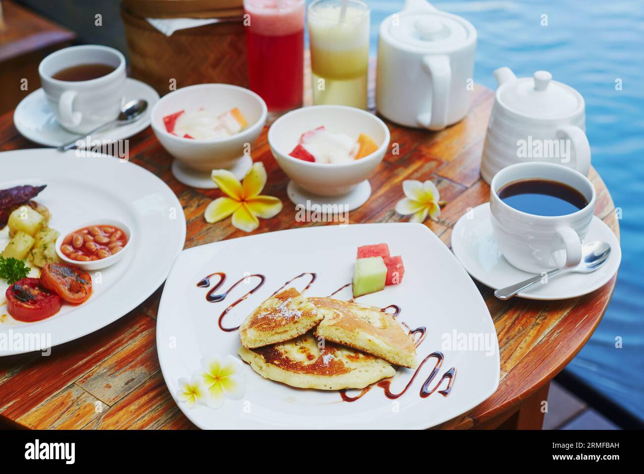 Traditional Balinese breakfast with fried noodles (mie goreng), banana ...