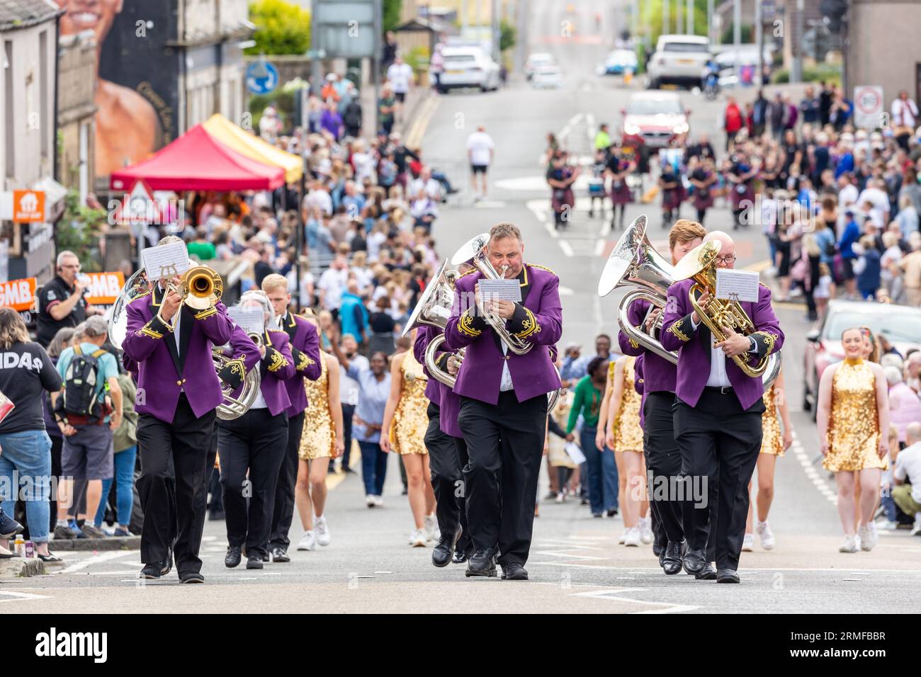 A brass band marching through the streets of Kelty before the Scottish ...