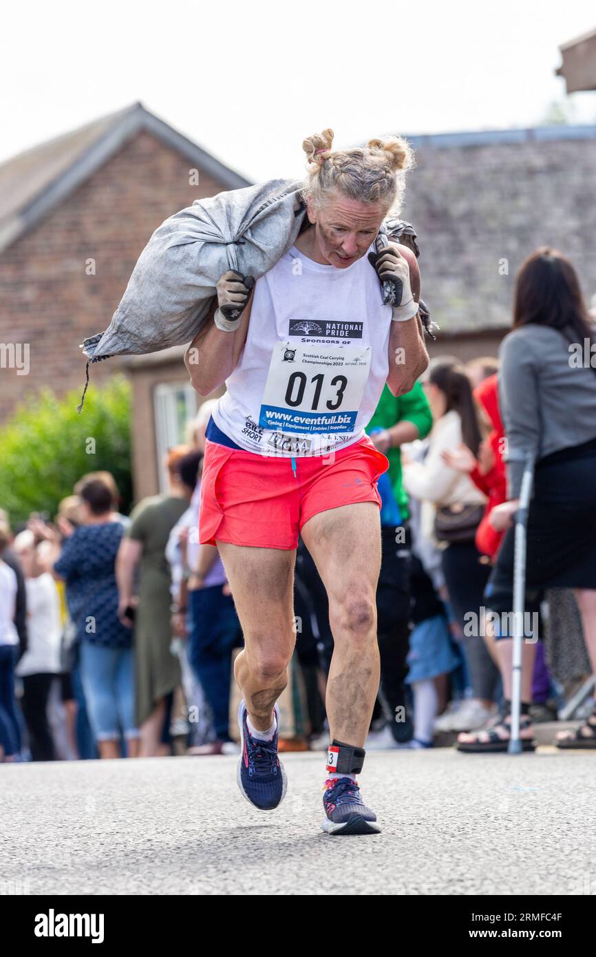 Competitors take part in the Scottish Coal Carrying Championships ...