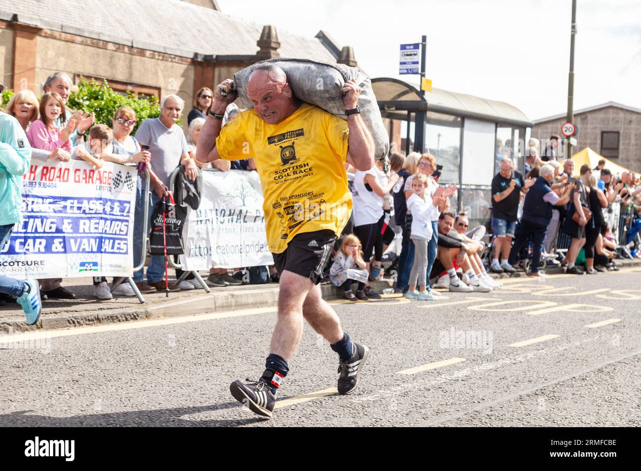 Competitors take part in the Scottish Coal Carrying Championships ...