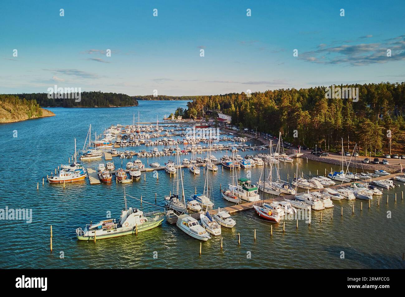 Scenic aerial view of colorful boats near wooden berth in the ...