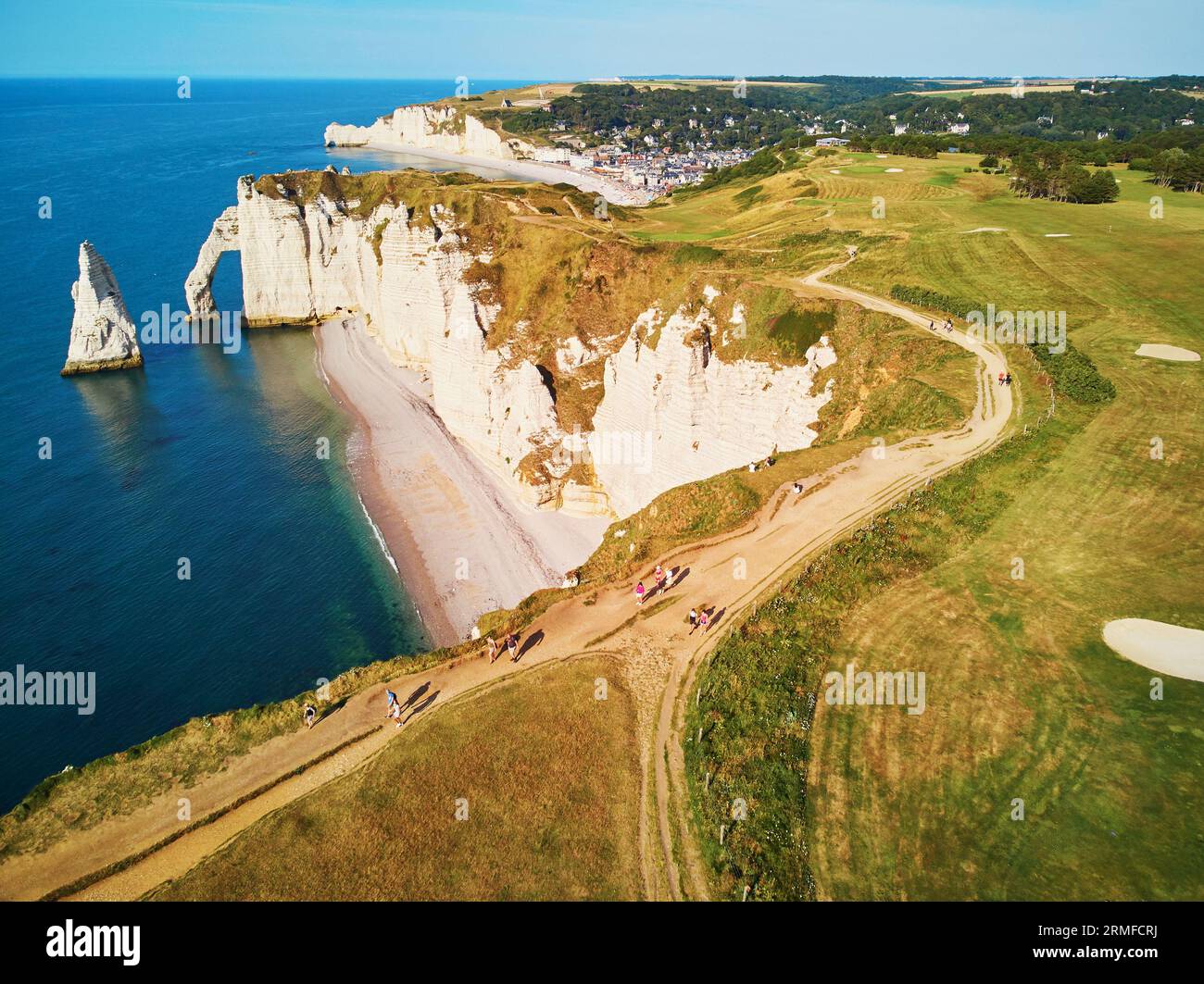 People walking on top of the cliff, enjoying picturesque panoramic ...