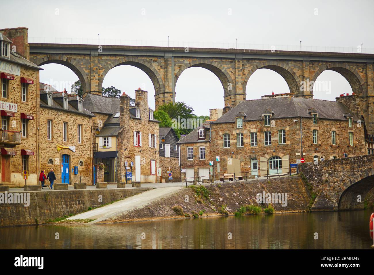 Scenic view of Dinan port and its viaduct over the river Rance, one of ...