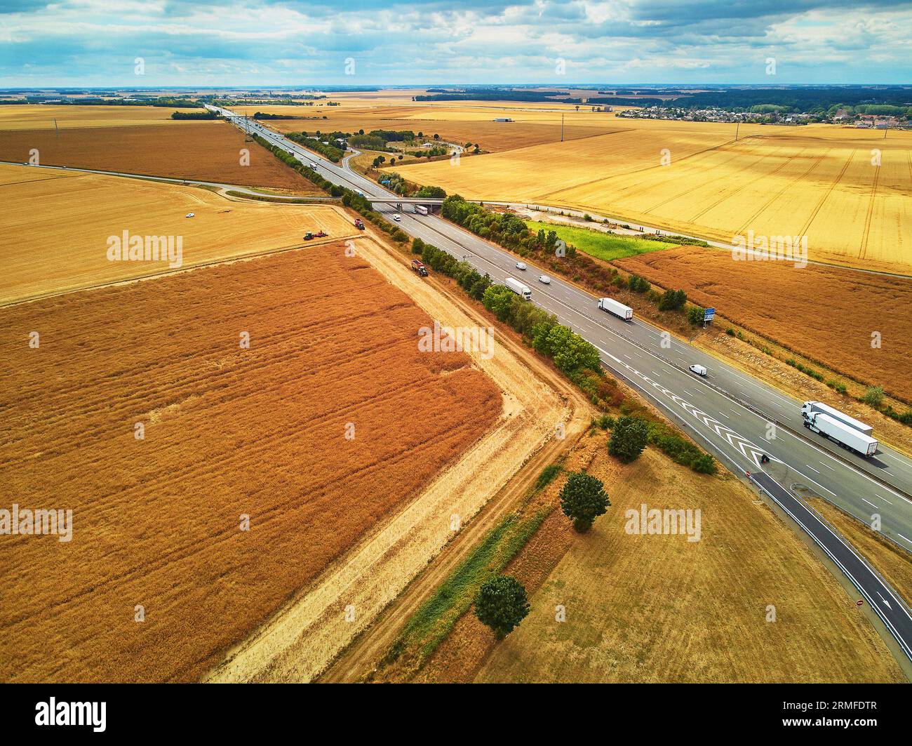 Aerial drone view of beautiful French countryside and six-lane motorway ...