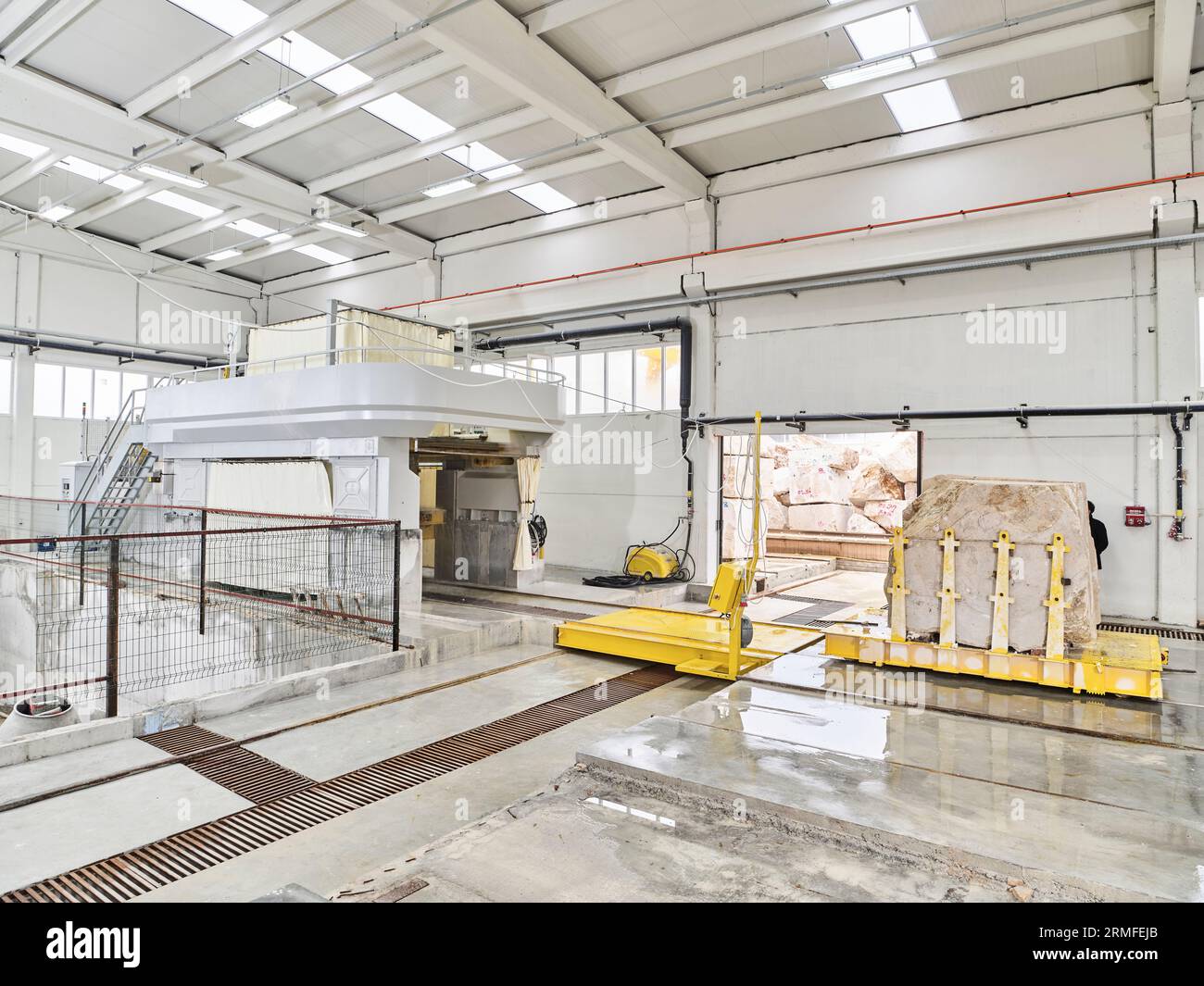 man in stone cutting factory/workshop. stone mine. marble mine ...