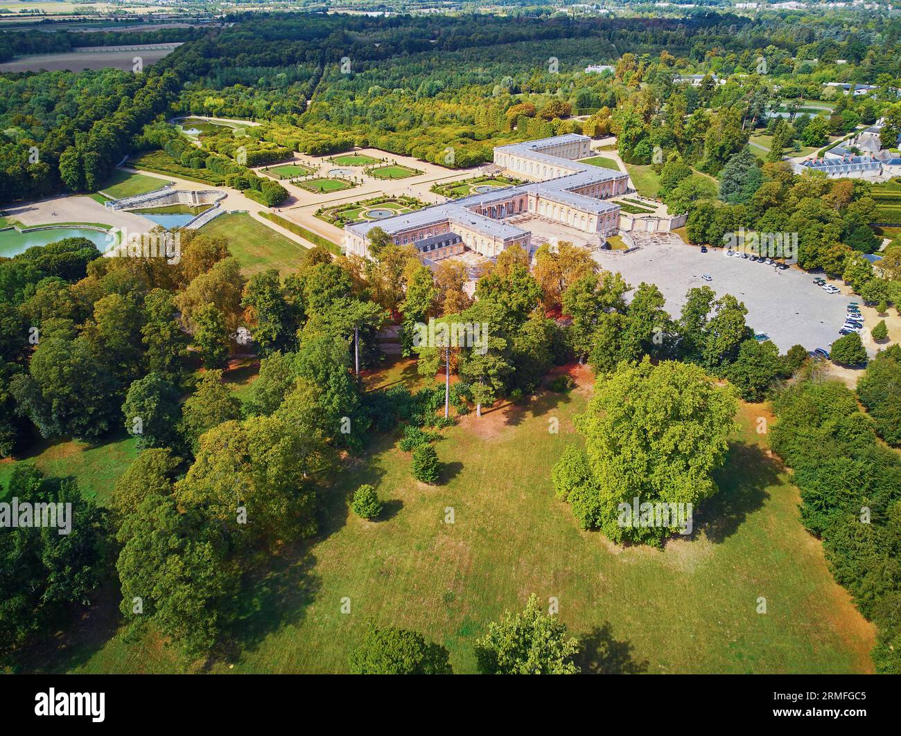 Aerial scenic view of Grand Trianon palace in the Gardens of Versailles ...