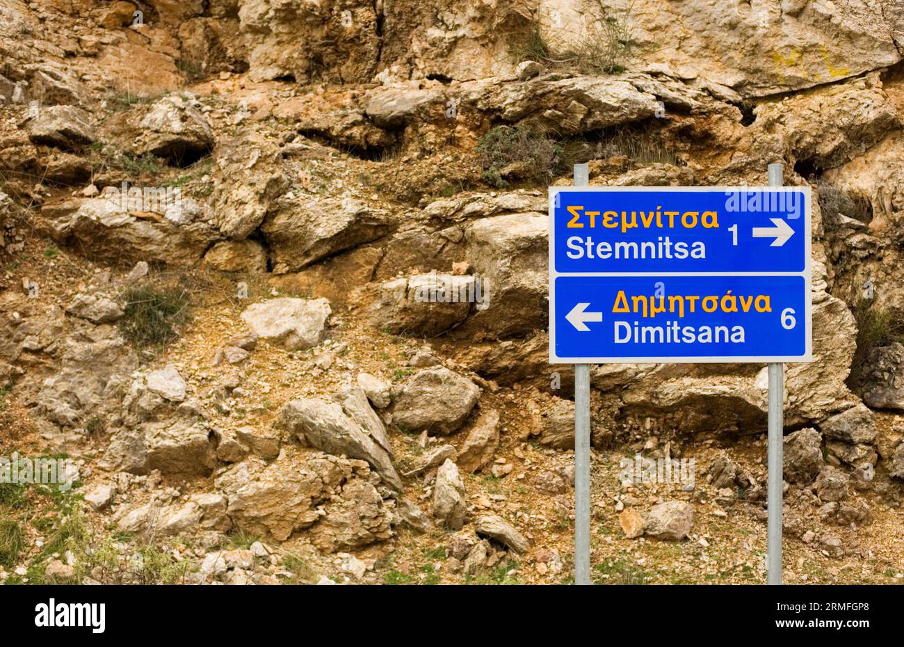 Road sign with directions to famous Greek mountain villages Dimitsana ...