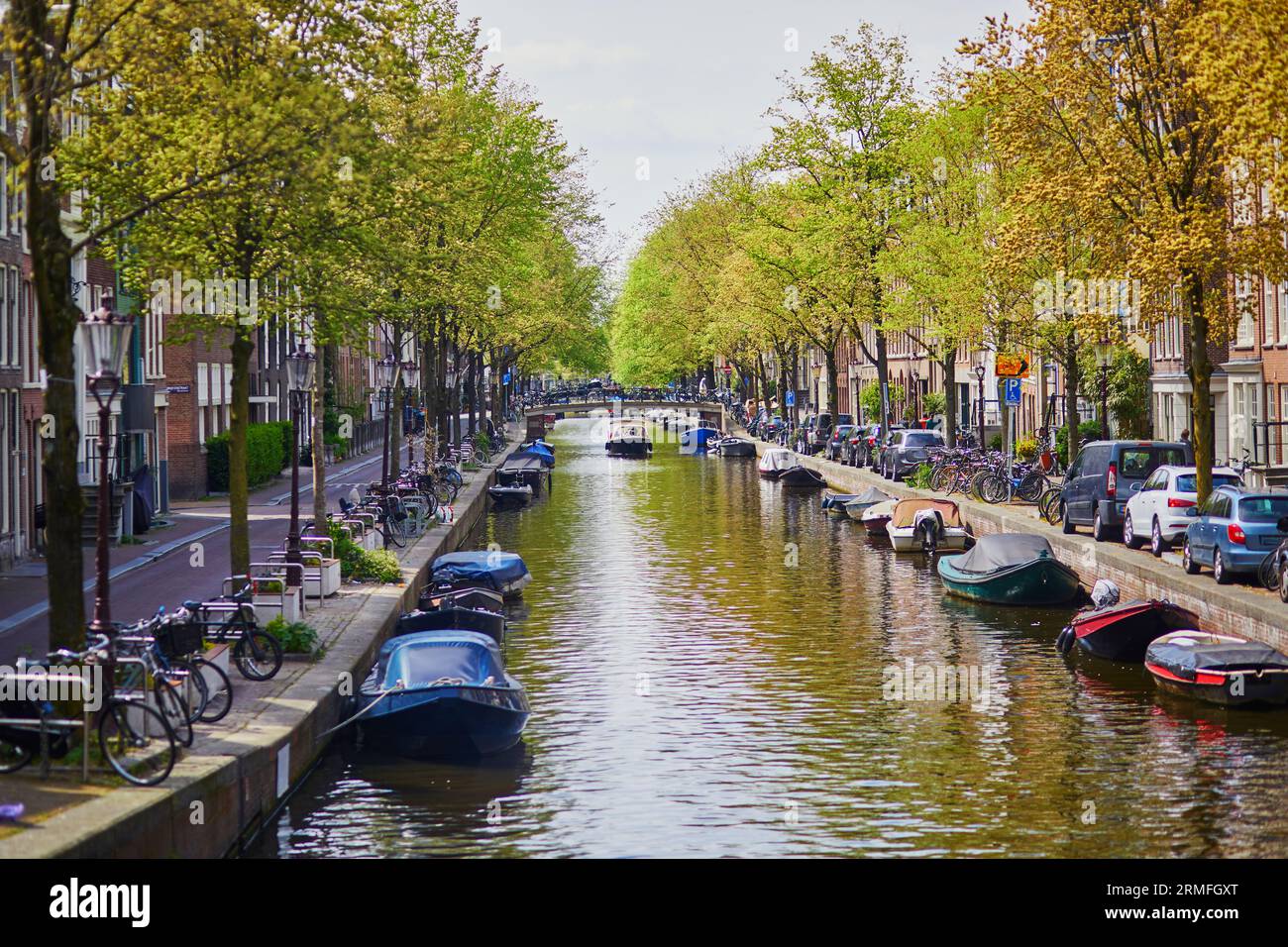 Scenic view of Amsterdam, the Netherlands with its canals, embankments ...