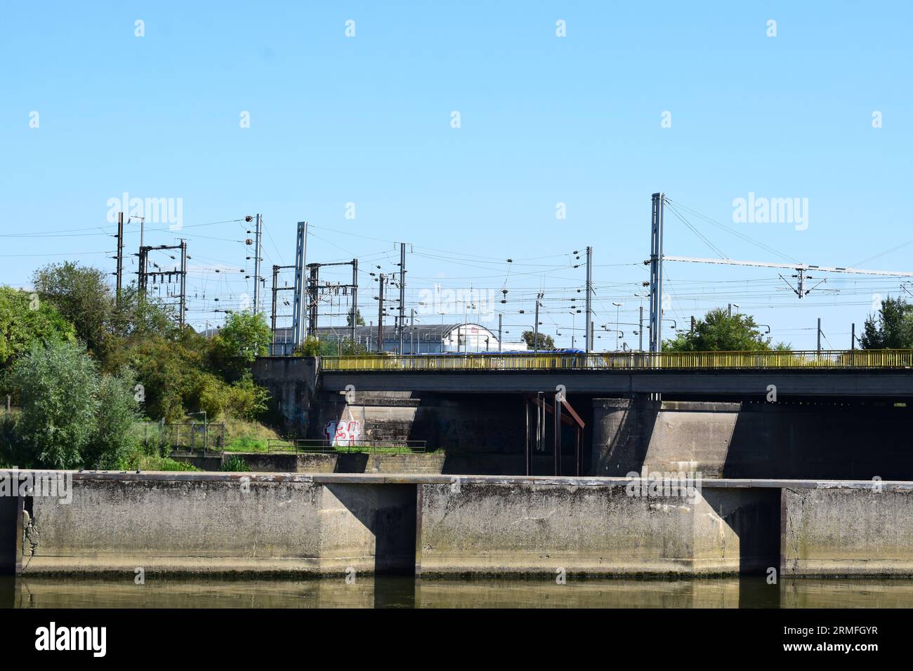 railroad bridge with a highway bridge above Stock Photo - Alamy