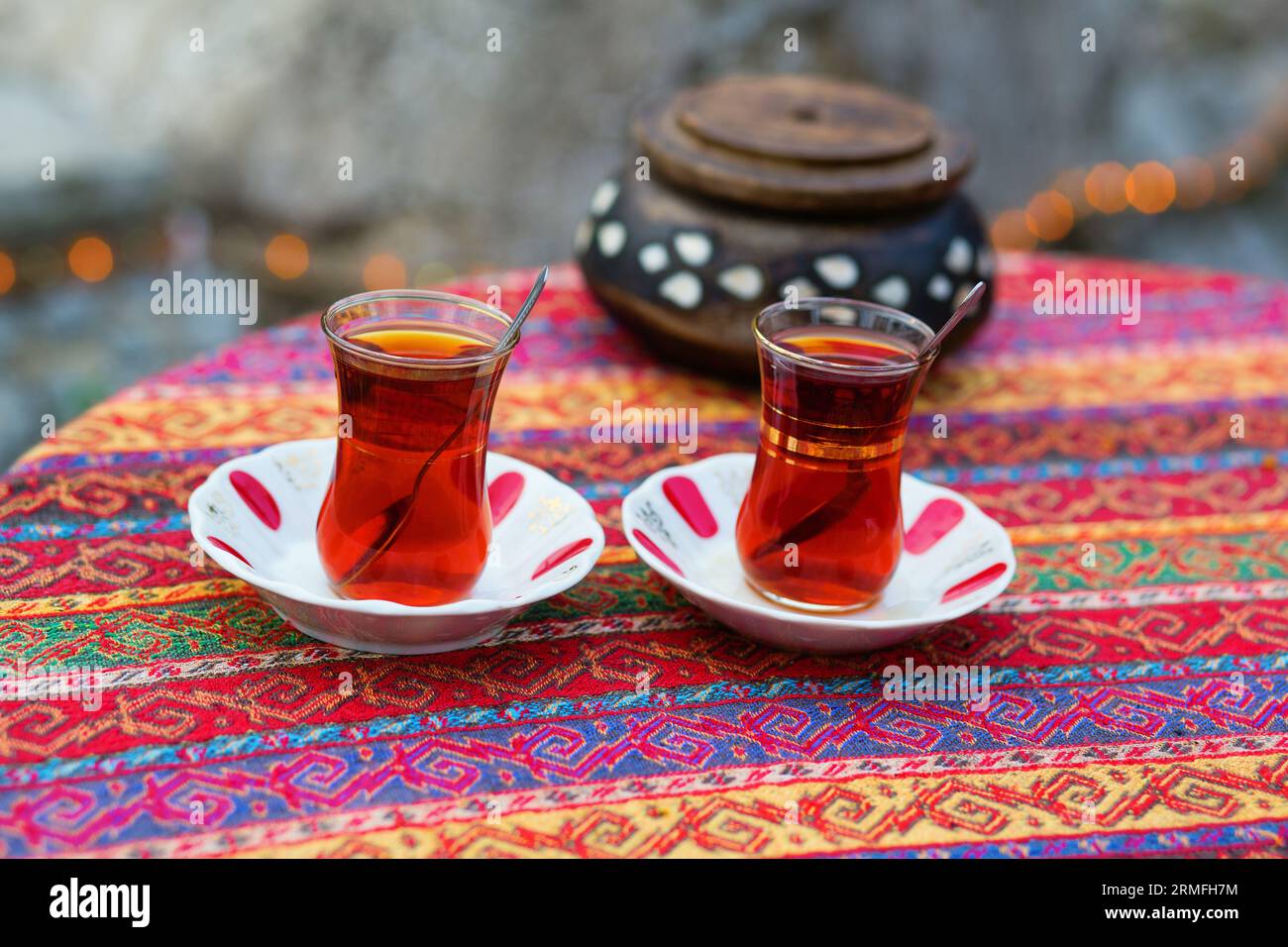 Black Turkish tea in traditional glasses Stock Photo - Alamy