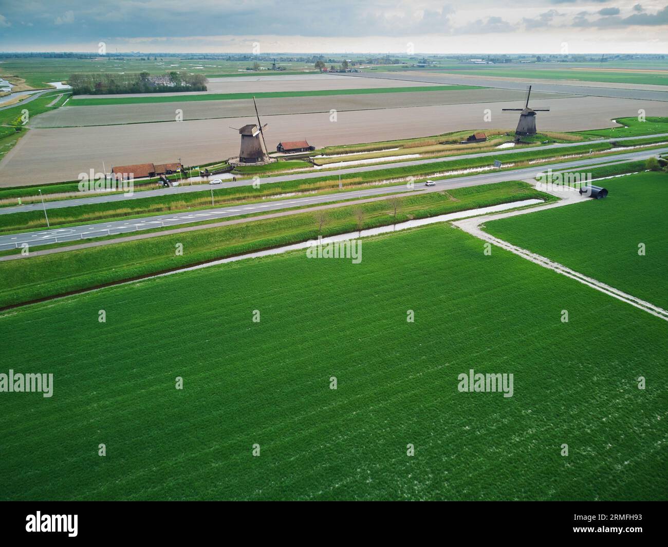 Aerial drone view of traditional Dutch windmill on the field. Typical ...