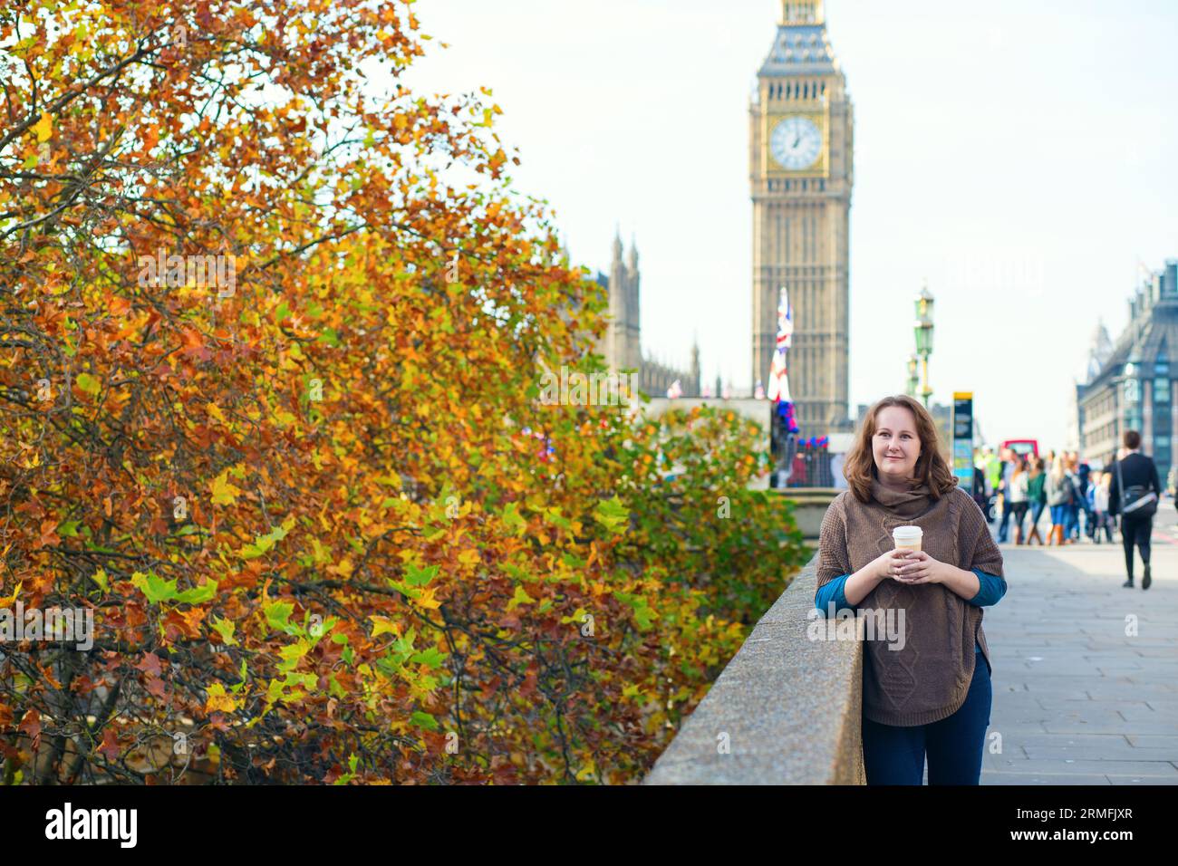 Woman drinking on street london hi-res stock photography and images - Alamy