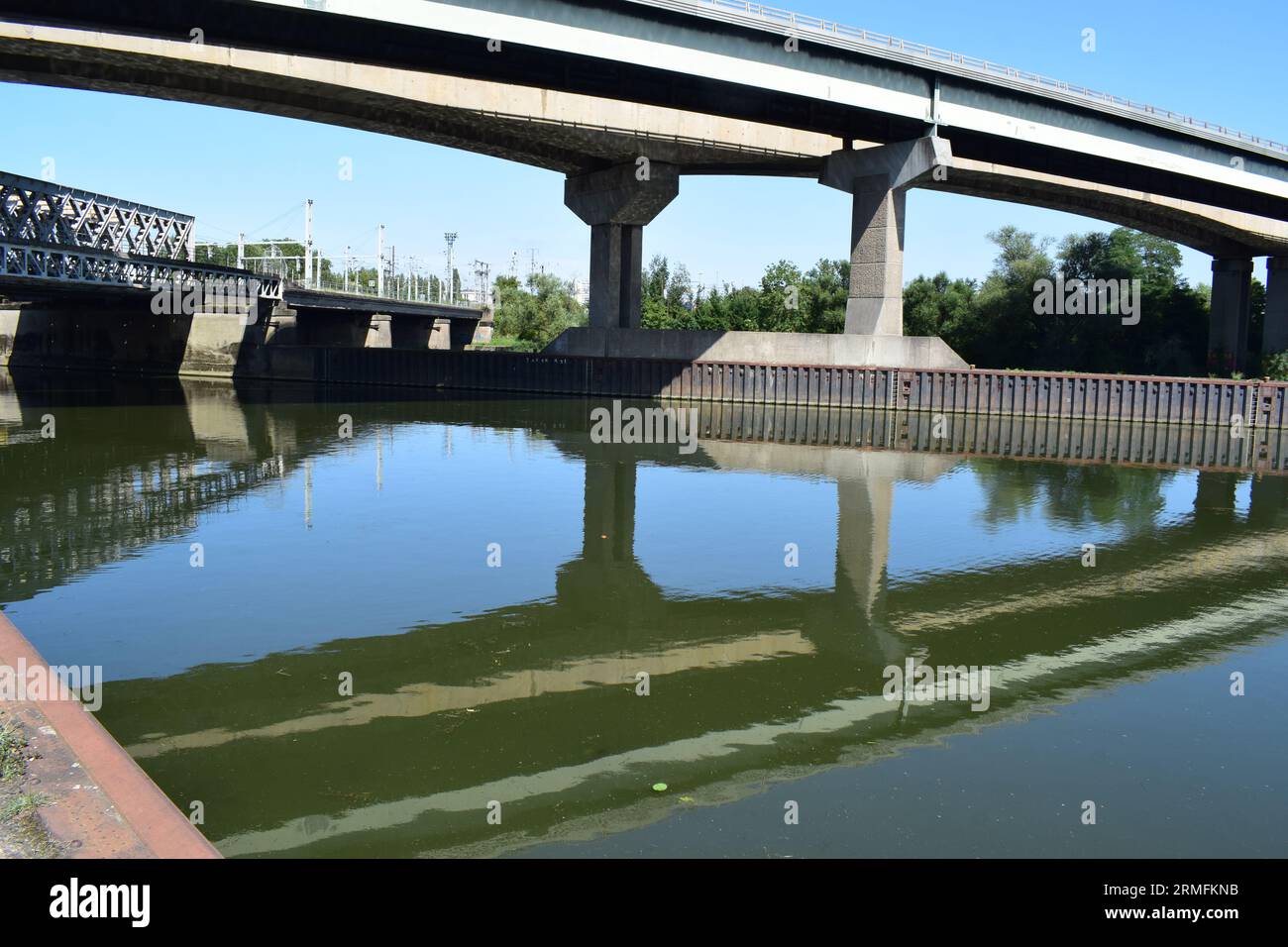 railroad bridge with a highway bridge above Stock Photo - Alamy