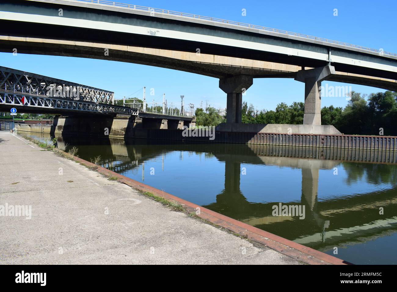 railroad bridge with a highway bridge above Stock Photo - Alamy
