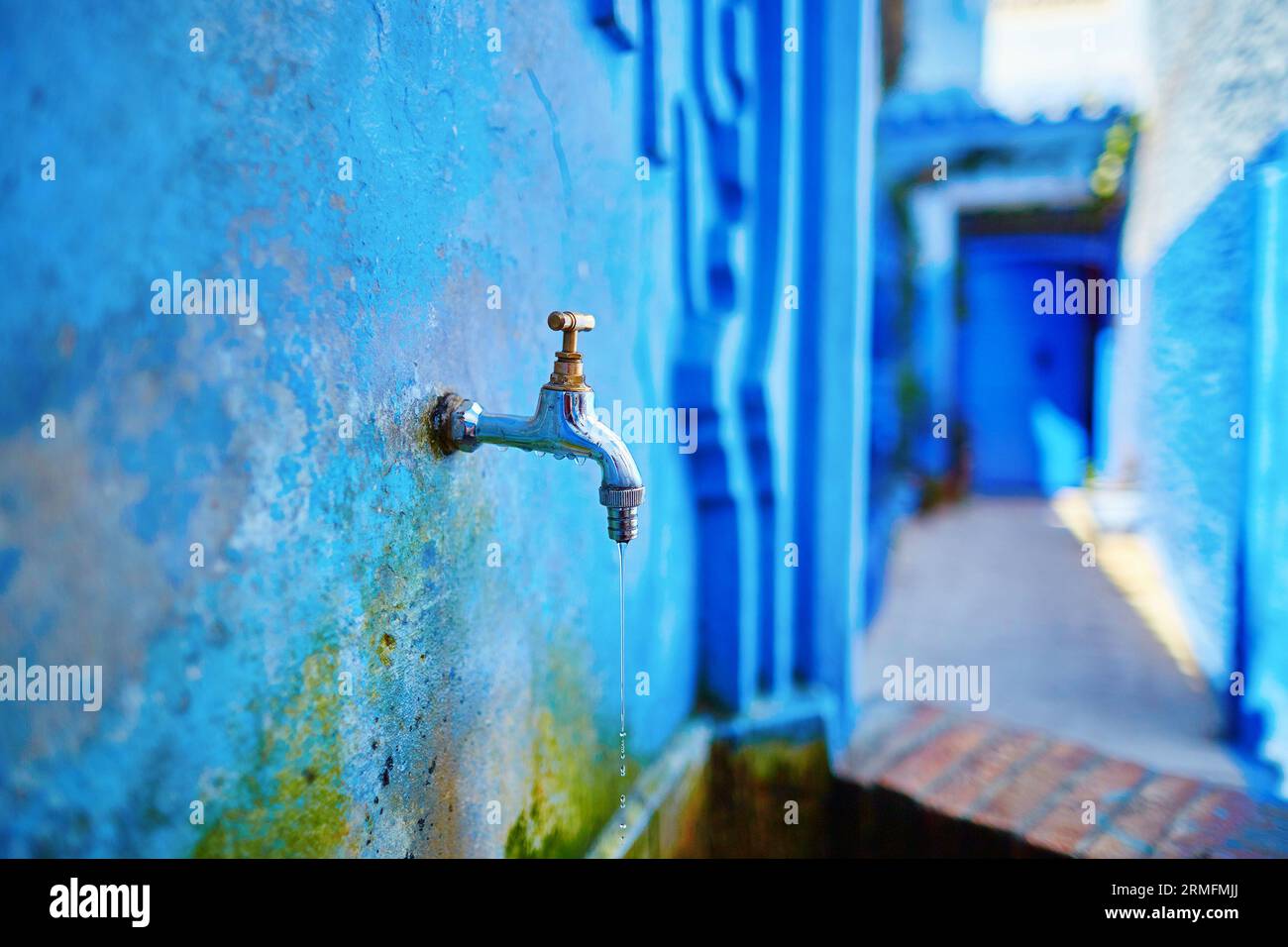 Small fountain with drinkable water on a street in Medina of ...