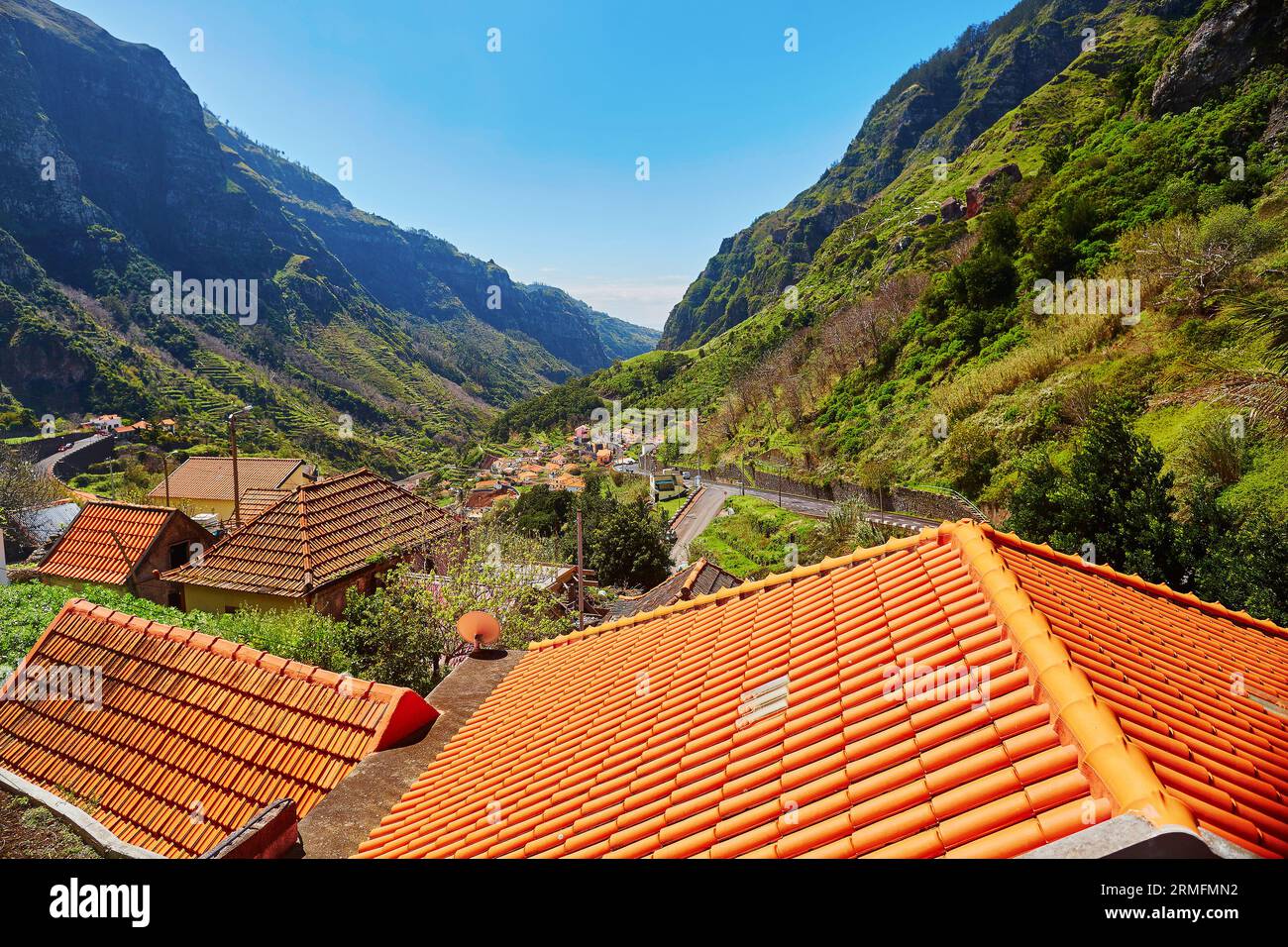 Aerial view of typical Madeira landscape with little villages, red ...