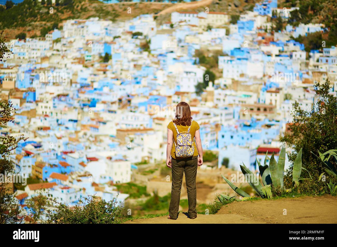 Tourist enjoying aerial view of of Chefchaouen, Morocco, small town in ...