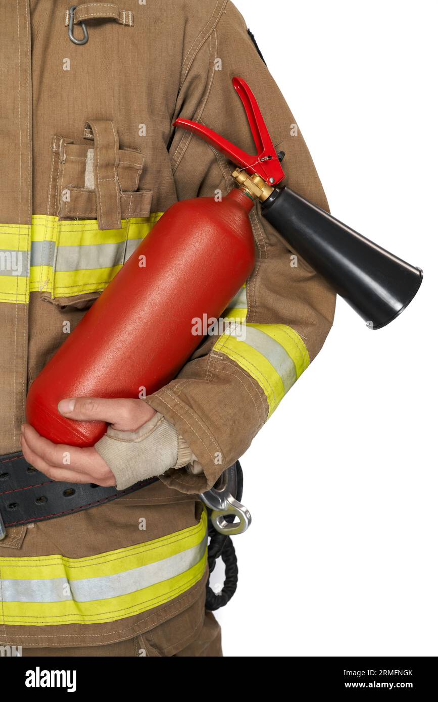 Anonymous male firefighter wearing uniform with red extinguisher. Close ...