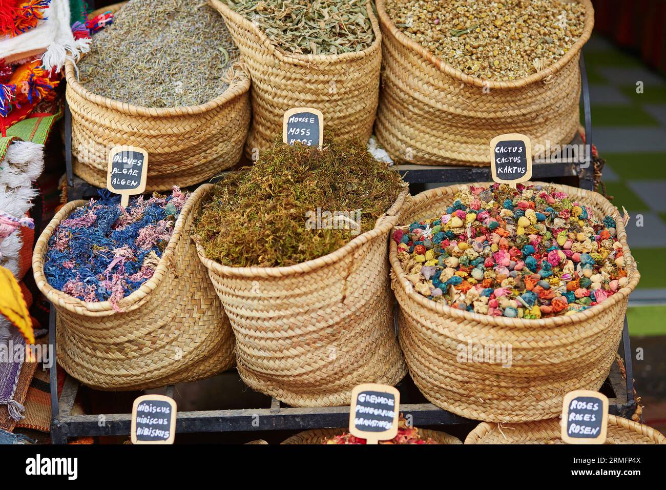 Selection of herbs and dry flowers on a traditional Moroccan market ...