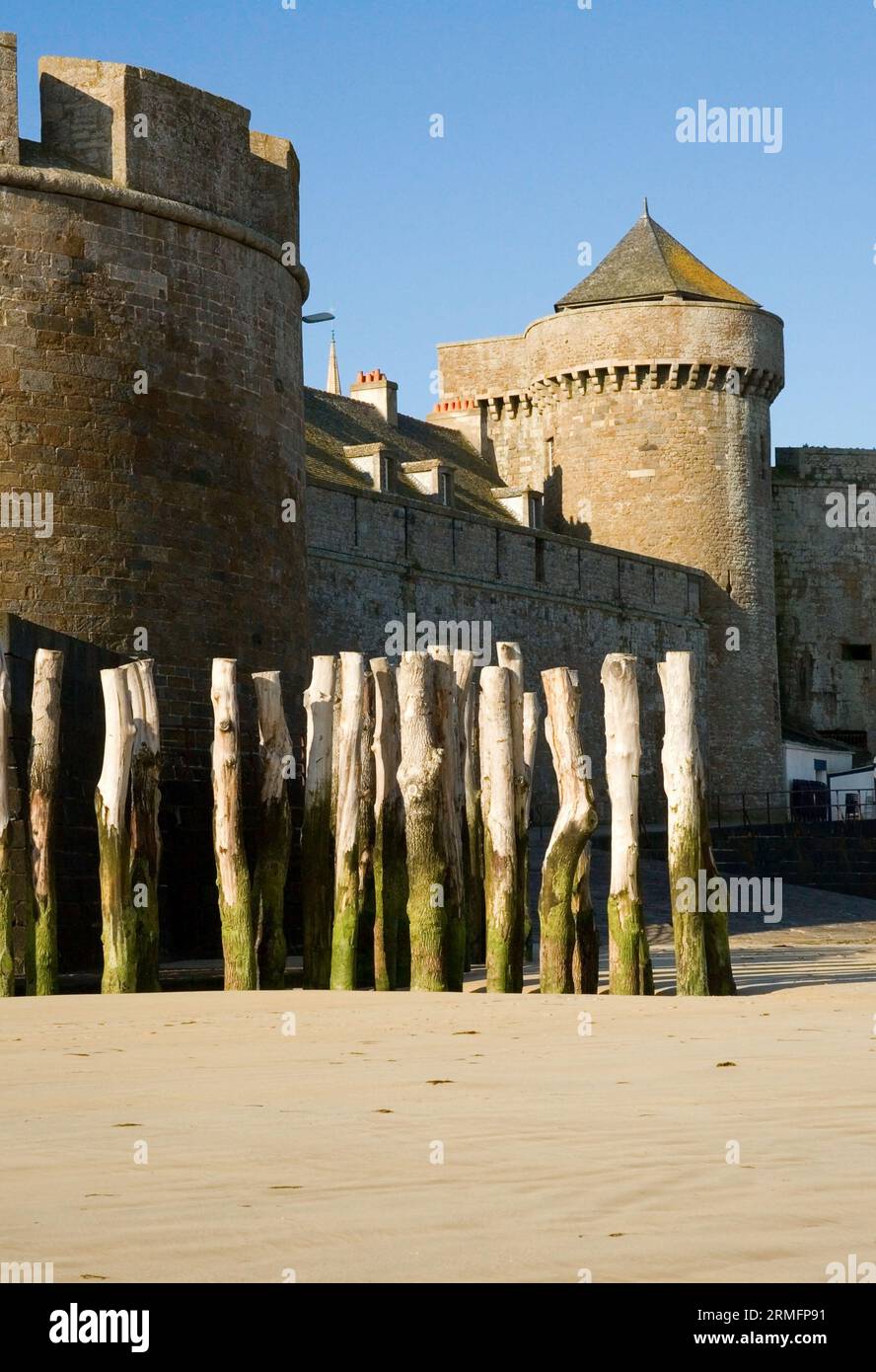 Old fortress wall and traditional wooden stakes at Saint-Malo (Brittany ...