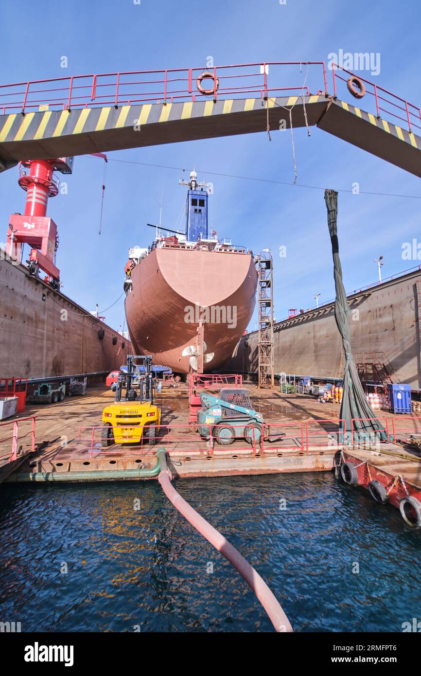 view of a shipyard repairing cargo ships. shipyard and industrial area ...