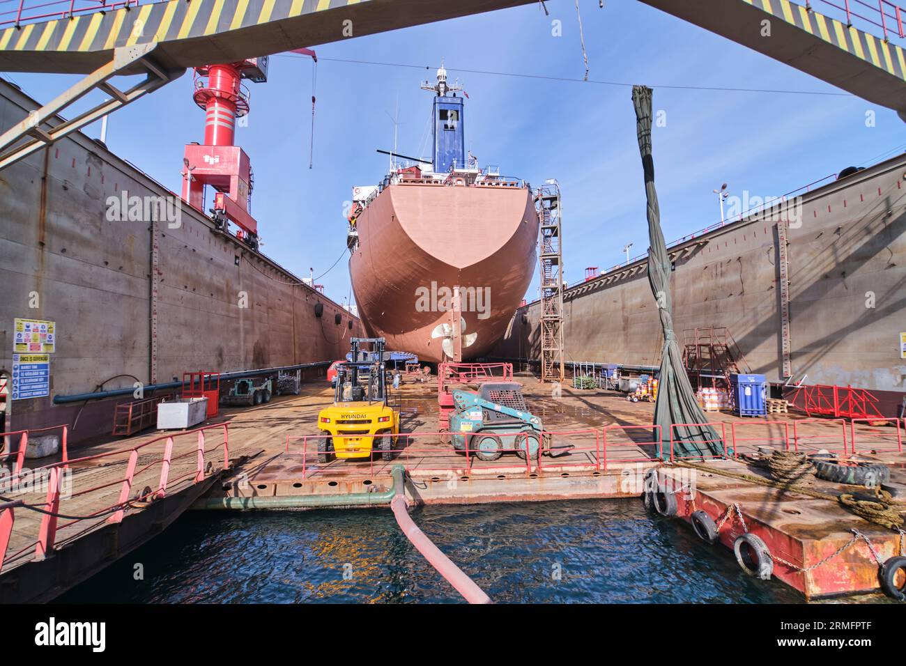 view of a shipyard repairing cargo ships. shipyard and industrial area ...