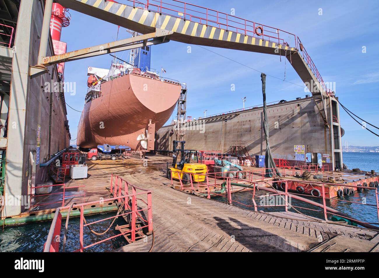 view of a shipyard repairing cargo ships. shipyard and industrial area ...