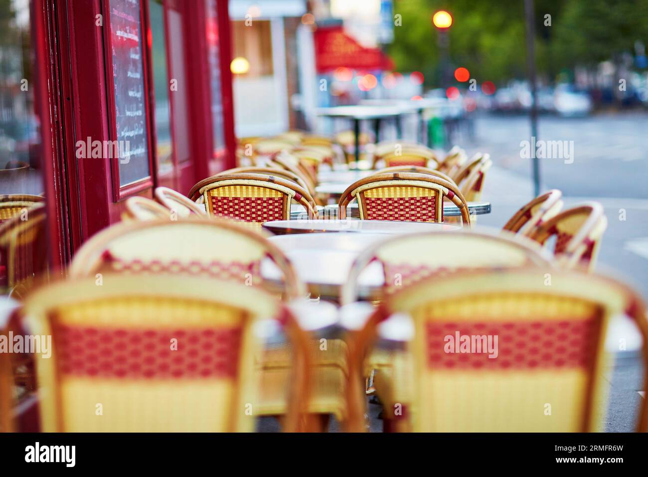 Tables of traditional outdoor French cafe in Paris Stock Photo - Alamy
