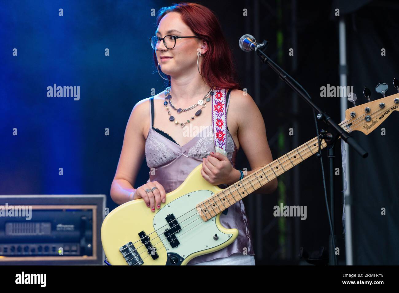 Bass player with the live band of Eaves Wilder at Green Man Festival in ...