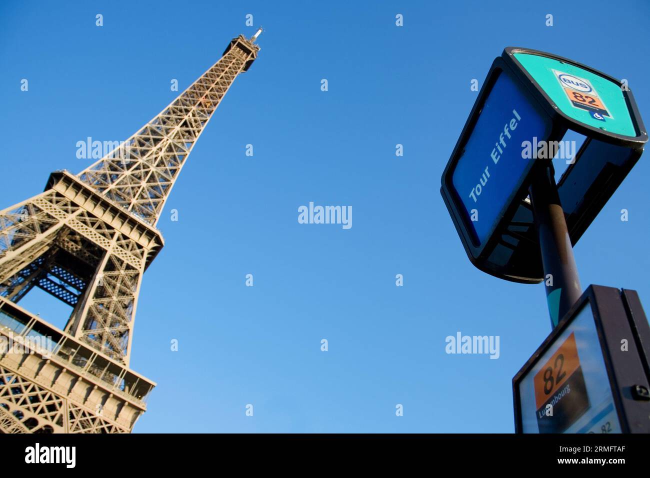 Around Paris by bus. Parisian bus stop near the Eiffel Tower Stock ...